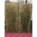 A pair of brass rubbing plaques