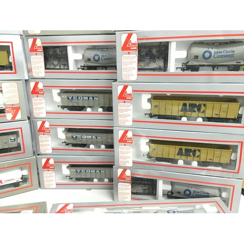 A Collection Of Boxed Lima 00 Gauge Wagons. Coaches Etc.