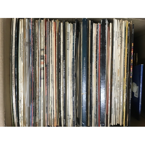 two boxes of Vinyl Records including albums by Meat Loaf, The Beatles ...