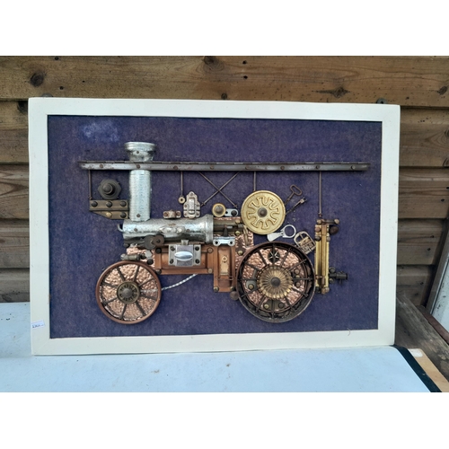 Mixed media picture of steam engine made with recycled pieces of metal