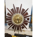 Wooden Sunburst "Anstey & Wilson" Wall Clock.