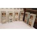 Six Boxed "The Classique Collection" Porcelain Dolls.
