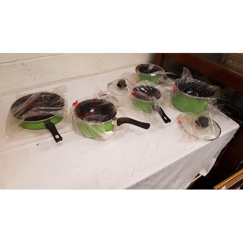Boxed Five Piece Green Saucepan Set.