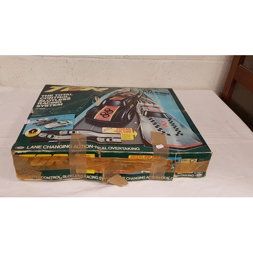 Boxed TCR Slotless Racing Car Set.
