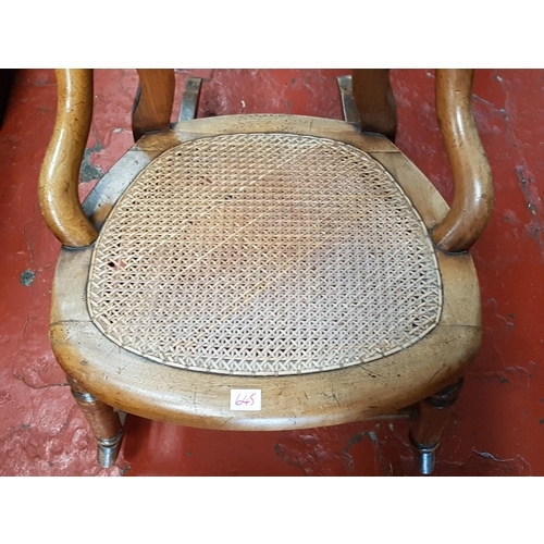 19th Century Dutch Inlaid Walnut Low Rocking Chair with Bergiere Seat.
