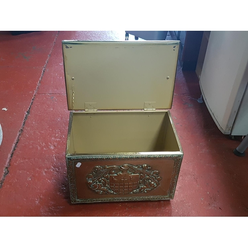Brass Log Box with Coat of Arms Detail.