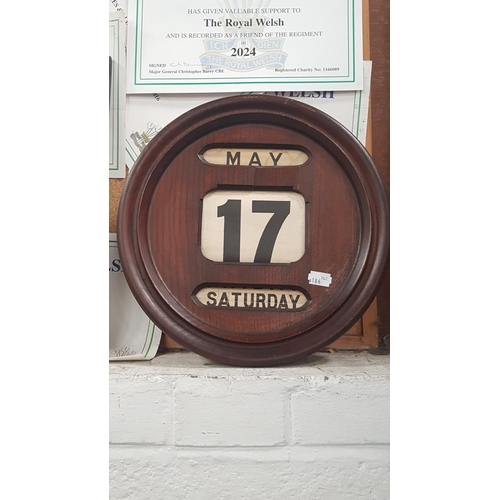 Mahogany Framed Manual Rolling Calendar.