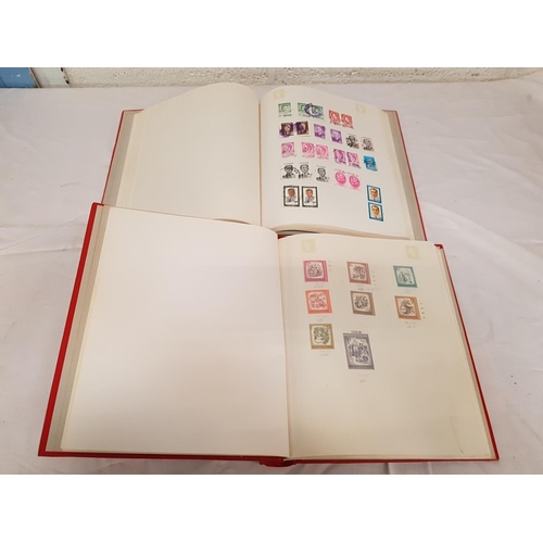 Two Stamp Albums with Assorted Stamps.