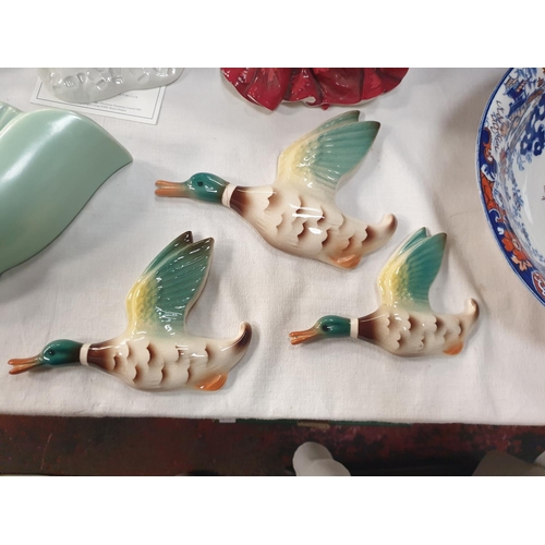 Three Graduated Flying Duck Wall Plaques - one restored.
