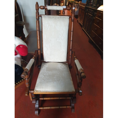 Cream Upholstered American Rocker.