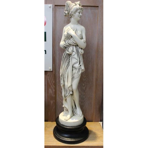 Cast statuette of Venus at her bath on plinth base, 77cm tall.