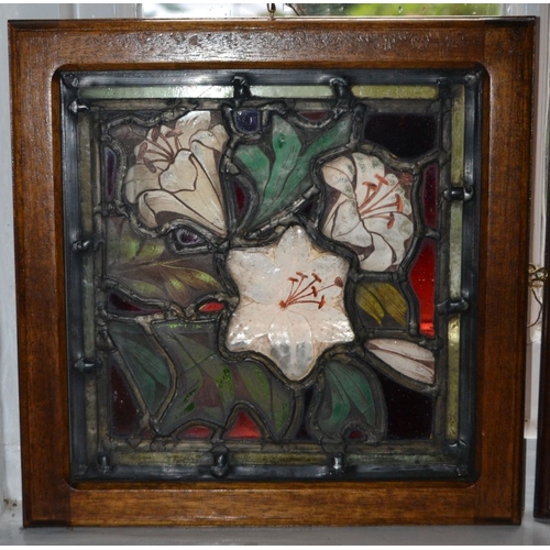 Two stained & leaded glass panels, flowers, 26" square, in oak frames