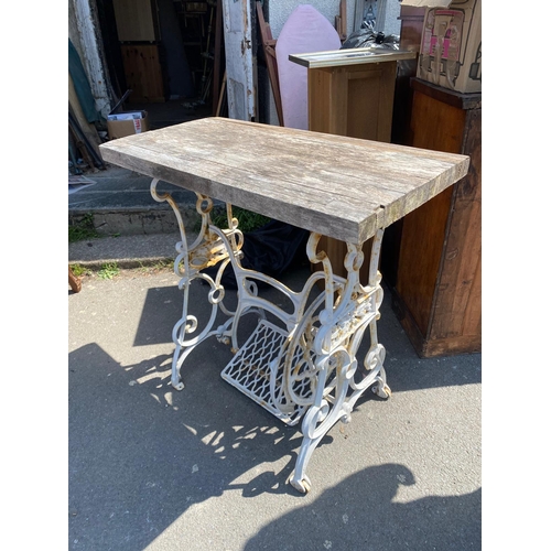 Cast iron treadle base table