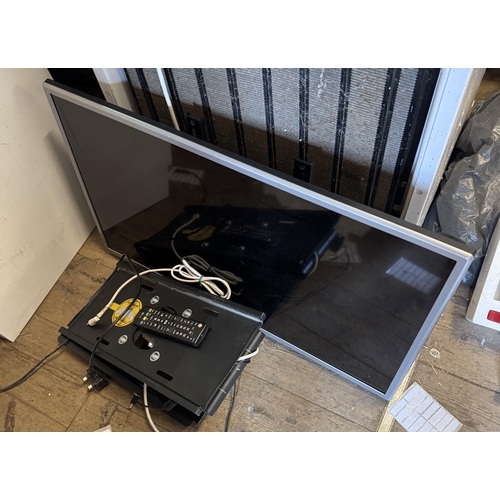 Tv & remote with bracket