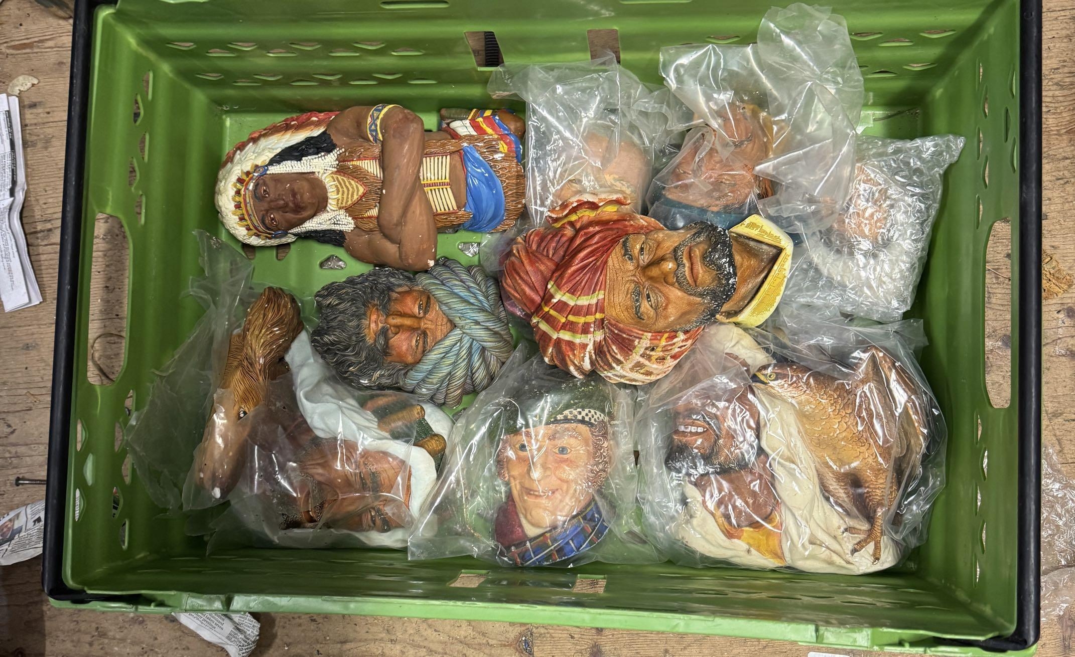 Plaster bossons head wall masks