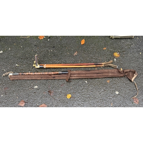 2 riding crops & fishing rod
