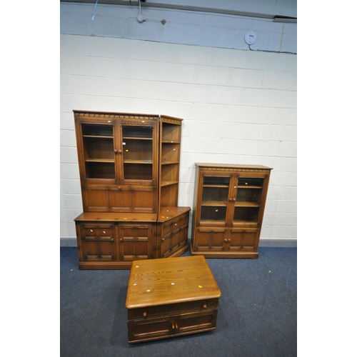AN ERCOL GRASMERE ELM TWO DOOR BOOKCASE, width 101cm x depth 31cm x ...