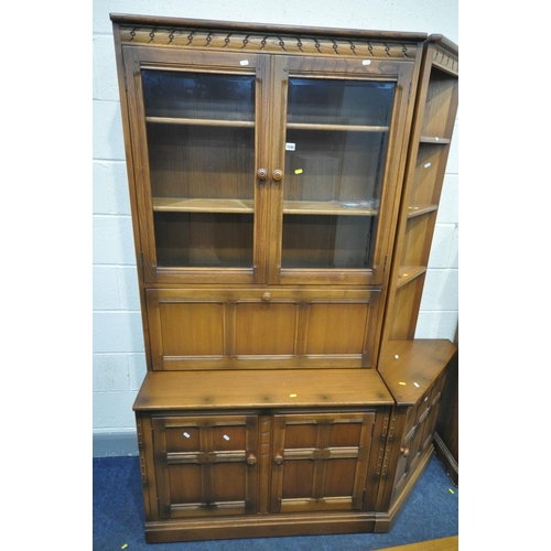 AN ERCOL GRASMERE ELM TWO DOOR BOOKCASE, width 101cm x depth 31cm x ...