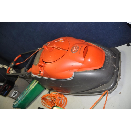 A FLYMO VISION COMPACT 380 LAWN MOWER and a NuTool Hedge Trimmer (both ...