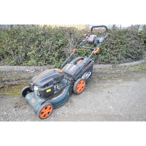 A BMC LAWNRACER 20ESi SELF PROPELLED PETROL LAWN MOWER with a Wolf ...