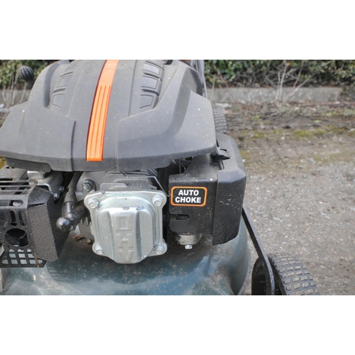 A BMC LAWNRACER 20ESi SELF PROPELLED PETROL LAWN MOWER with a Wolf ...