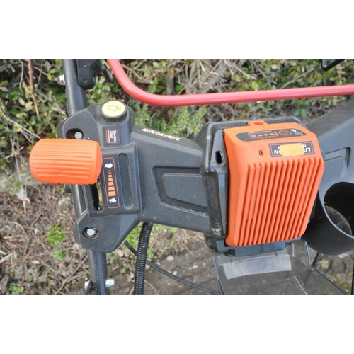 A BMC LAWNRACER 20ESi SELF PROPELLED PETROL LAWN MOWER with a Wolf ...