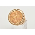 A MOUNTED FULL SOVEREIGN RING, full sovereign dated 1912, within a ...