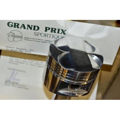 A FORMULA 1 NUMBER 8 PISTON AS USED BY CARLOS REUTERMANN, the race was ...