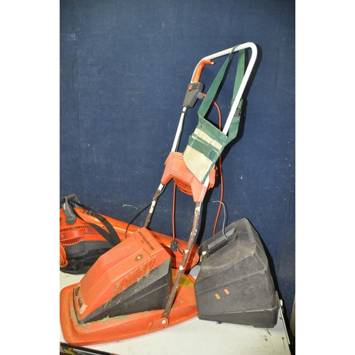 A FLYMO XE400 SPRINTMASTER LAWN MOWER with grass box along with a Flymo ...
