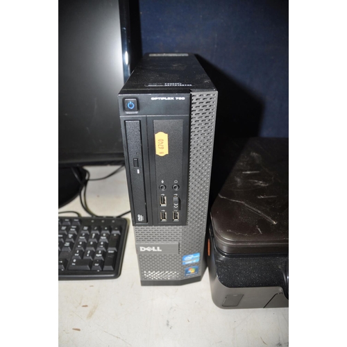 A DELL KXGVD COMPUTER TOWER with a Samsung LS22A100NS monitor ...