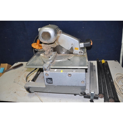 AN ELU TGS173 FLIP OVER SAW with 10in blade, 240v motor with four ...