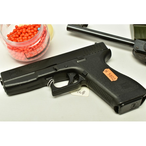 A BB GUN BASED ON THE DESIGN OF THE 9mm GLOCK PISTOL, plus a container ...