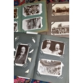 THREE 20TH CENTURY POSTCARD ALBUMS, comprising two albums containing ...