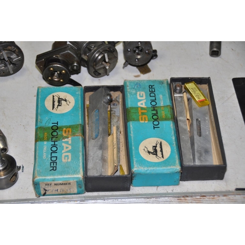 AN AMMO BOX CONTAINING METALWORKING LATHE CUTTERS AND ATTACHMENTS ...