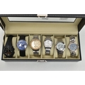 A WATCH DISPLAY CASE WITH SIX WRISTWATCHES, to include a 'Casio HD ...