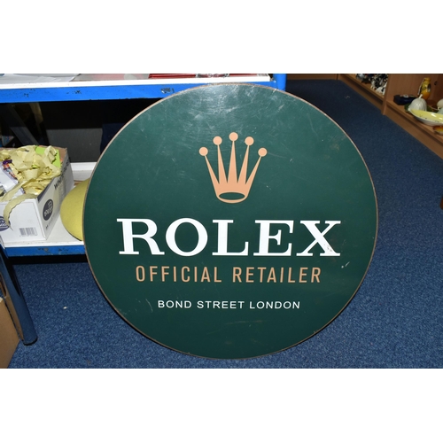 A LARGE CIRCULAR ROLEX SHOP SIGN, diameter 61cm, green background with ...