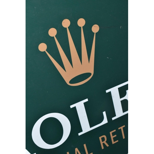 A LARGE CIRCULAR ROLEX SHOP SIGN, diameter 61cm, green background with ...