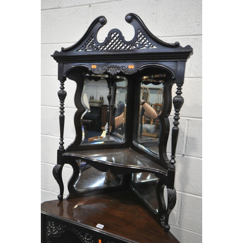 AN EDWARDIAN MAHOGANY OPEN CORNER UNIT, with an arrangement of mirrors ...