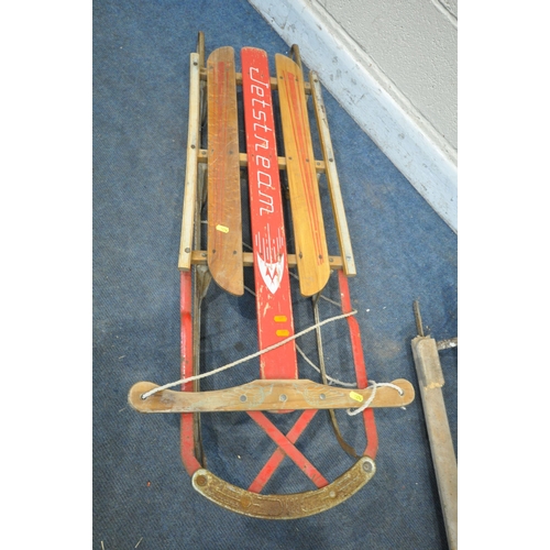 A VINTAGE WOODEN AND METAL SLEDGE, with steering and brakes, along with ...