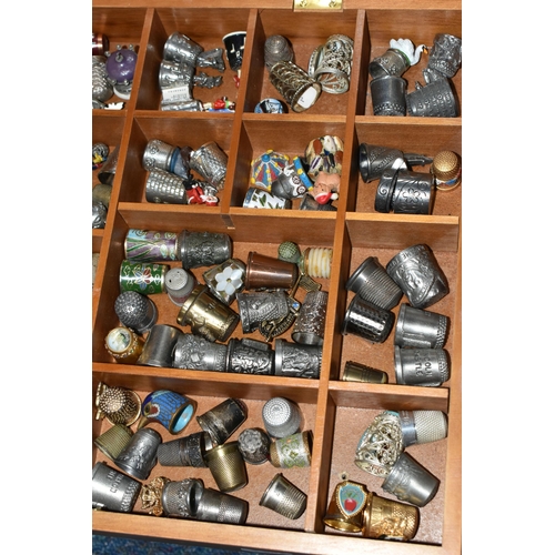 A BOX AND A TRAY OF THIMBLES, to include approximately two hundred ...