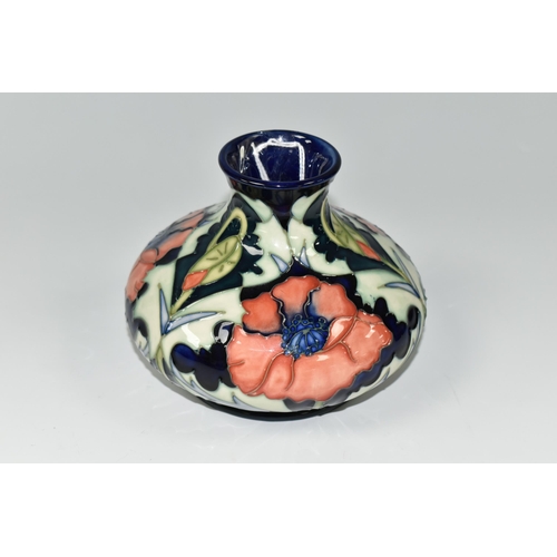 A MOORCROFT POTTERY POPPY PATTERN VASE, of squat bulbous form, with ...