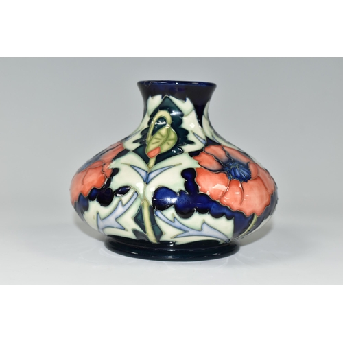 A MOORCROFT POTTERY POPPY PATTERN VASE, of squat bulbous form, with ...