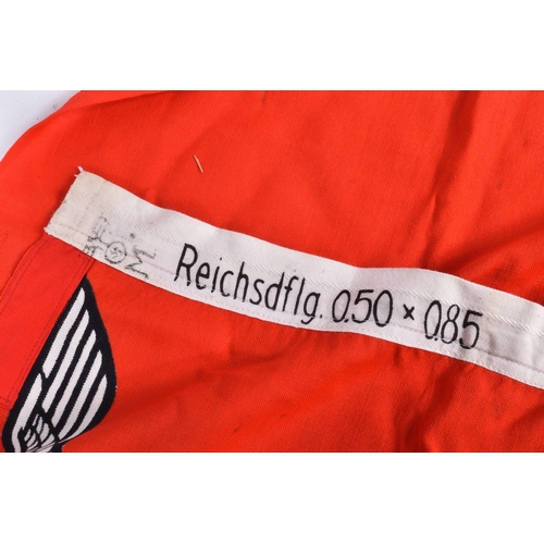 TWO GERMAN FLAGS WITH SWASTIKA SYMBOLS, the first has a printed size ...