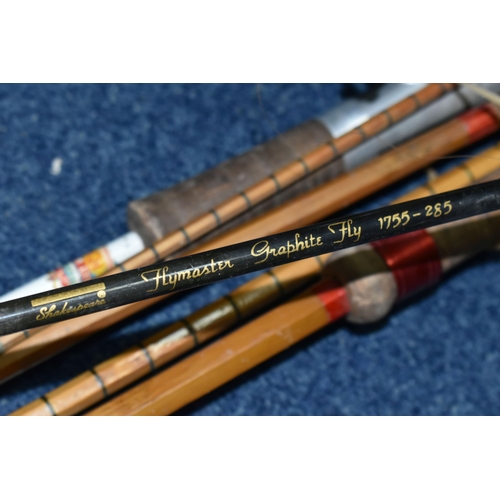 A GROUP OF FOUR VINTAGE FISHING RODS, to include a Shakespeare ...