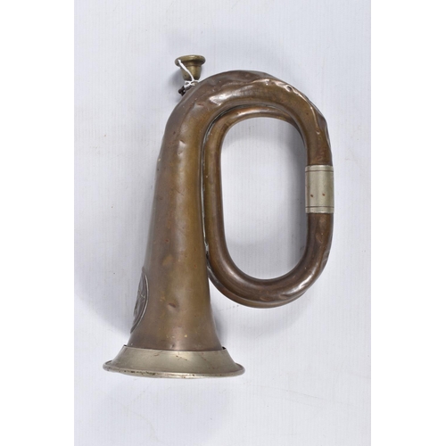 A GERMAN MILITARY BUGLE COMPLETE WITH BADGE, this is complete with ...