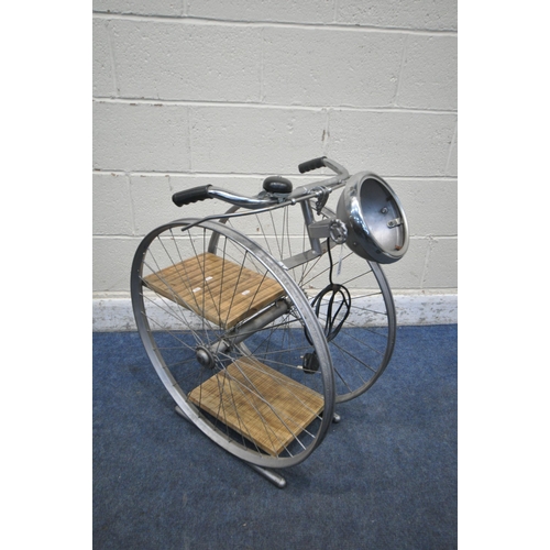 A BESPOKE VINTAGE BICYCLE WHEEL FLOOR LAMP, with two shelves, width ...