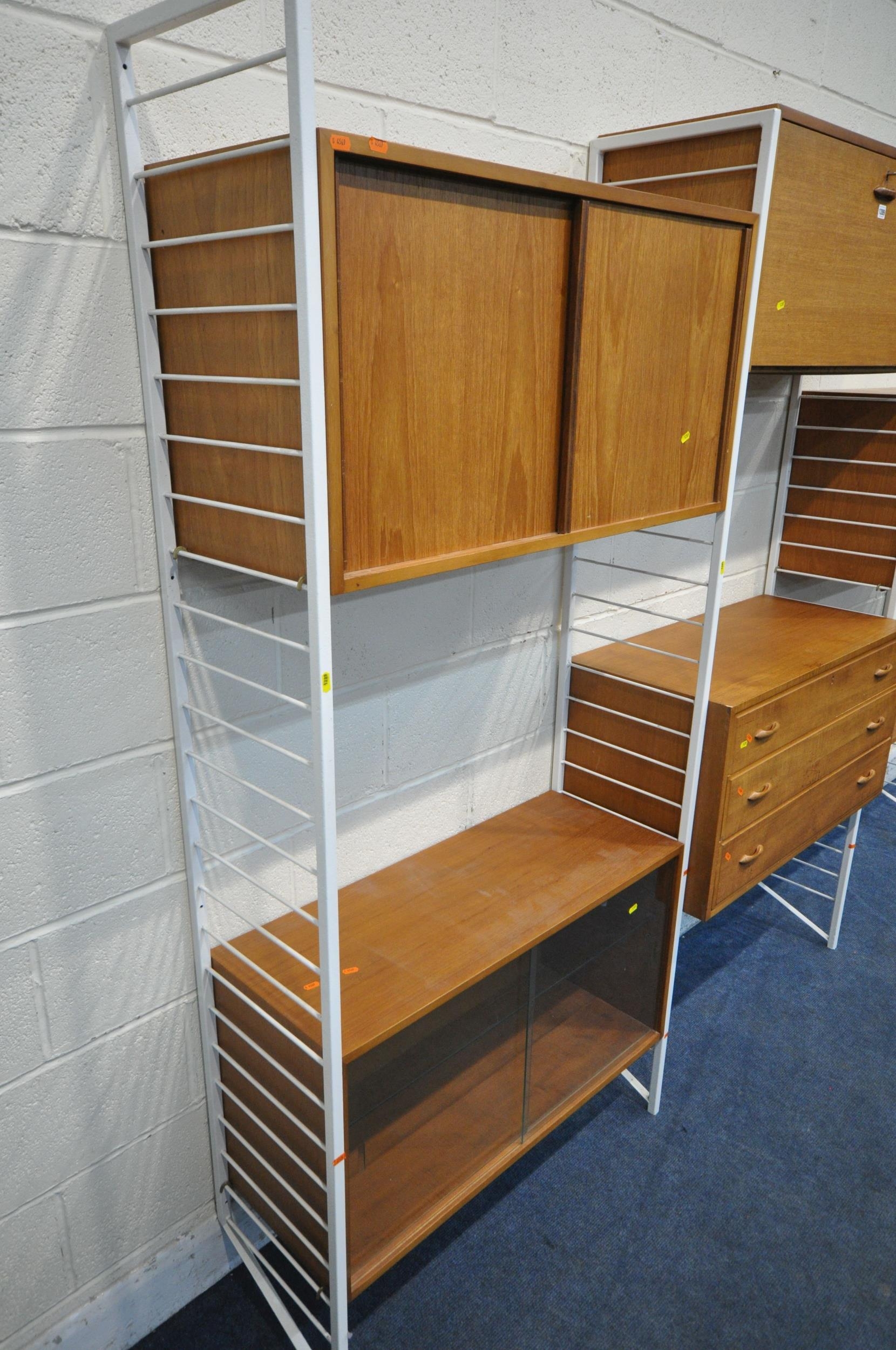 A MID CENTURY TEAK LADDERAX UNIT, comprising four white painted ...