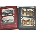 TWO ALBUMS OF POSTCARDS containing approximately 440 miscellaneous ...