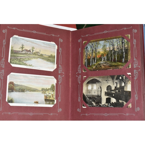 TWO ALBUMS OF POSTCARDS containing approximately 440 miscellaneous ...