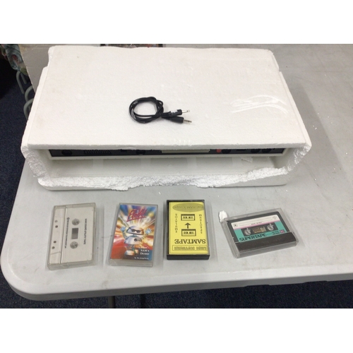 MGT SAM COUPE COMPUTER BOXED, includes some tapes and guides, tapes are ...